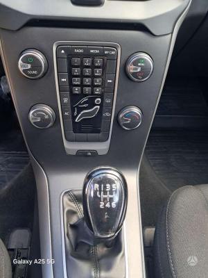 White Volvo V40 2013 in Marijampole, with an engine capacity of 1.56 L and mileage of 271 thousand km for 4800 €, photo 14 on AUTOMOTO.COM.LV
