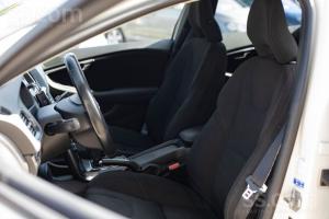 White Volvo V40 2014 in Riga, with an engine capacity of 2.00 L and mileage of 270 thousand km for 6790 €, photo 12 on AUTOMOTO.COM.LV