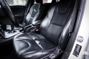 White Volvo V40 2015 in Riga, with an engine capacity of 1.60 L and mileage of 223 thousand km for 7790 €, photo 13 on AUTOMOTO.COM.LV