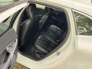 White Volvo V40 2015 in Bauska, with an engine capacity of 2.00 L and mileage of 264 thousand km for 6400 €, photo 18 on AUTOMOTO.COM.LV