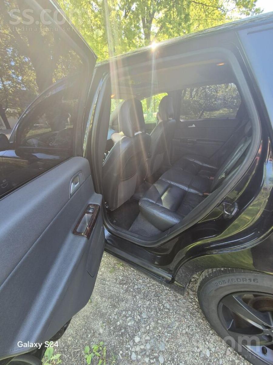 Melns Volvo V50 2008 Jelgava, ar dzinēja tilpumu 2.40 L un nobraukumu 340 tūkst. km par 3000 €, foto 13 vietnē AUTOMOTO.COM.LV