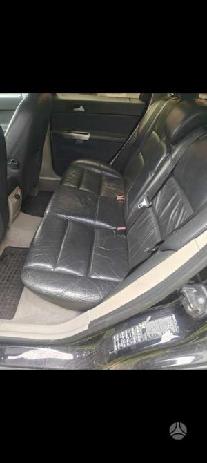 Melns Volvo V50 2005 Viļņa, ar dzinēja tilpumu 2.00 L un nobraukumu 393 tūkst. km par 1700 €, foto 7 vietnē AUTOMOTO.COM.LV
