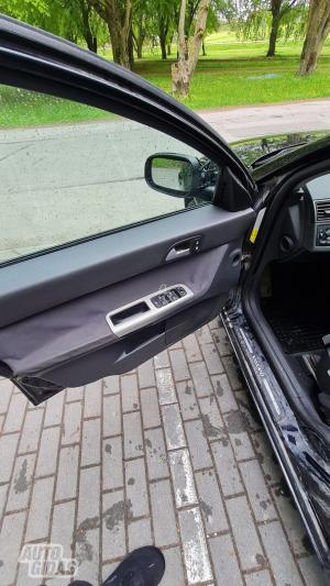 Black Volvo V50 2006 in Ariogala, with an engine capacity of 2.00 L and mileage of 413 thousand km for 1400 €, photo 14 on AUTOMOTO.COM.LV