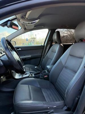 Melns Volvo V50 2007 Rīga, ar dzinēja tilpumu 2.40 L un nobraukumu 305 tūkst. km par 2300 €, foto 17 vietnē AUTOMOTO.COM.LV