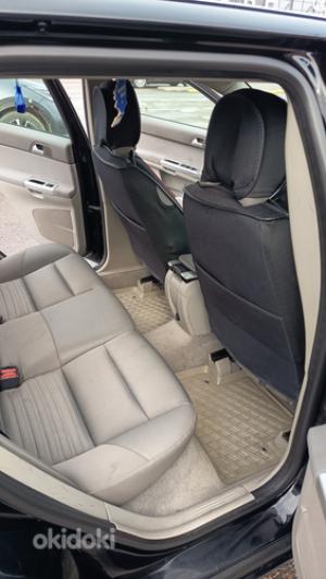 Black Volvo V50 2009 in Tallinn, with an engine capacity of 1.60 L and mileage of 338 thousand km for 2200 €, photo 10 on AUTOMOTO.COM.LV