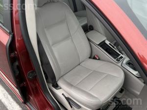 Sarkans Volvo V50 2008 Liepāja, ar dzinēja tilpumu 2.40 L un nobraukumu 240 tūkst. km par 3950 €, foto 14 vietnē AUTOMOTO.COM.LV