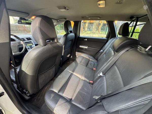 White Volvo V50 2011 in Kaunas, with an engine capacity of 1.56 L and mileage of 280 thousand km for 2999 €, photo 6 on AUTOMOTO.COM.LV