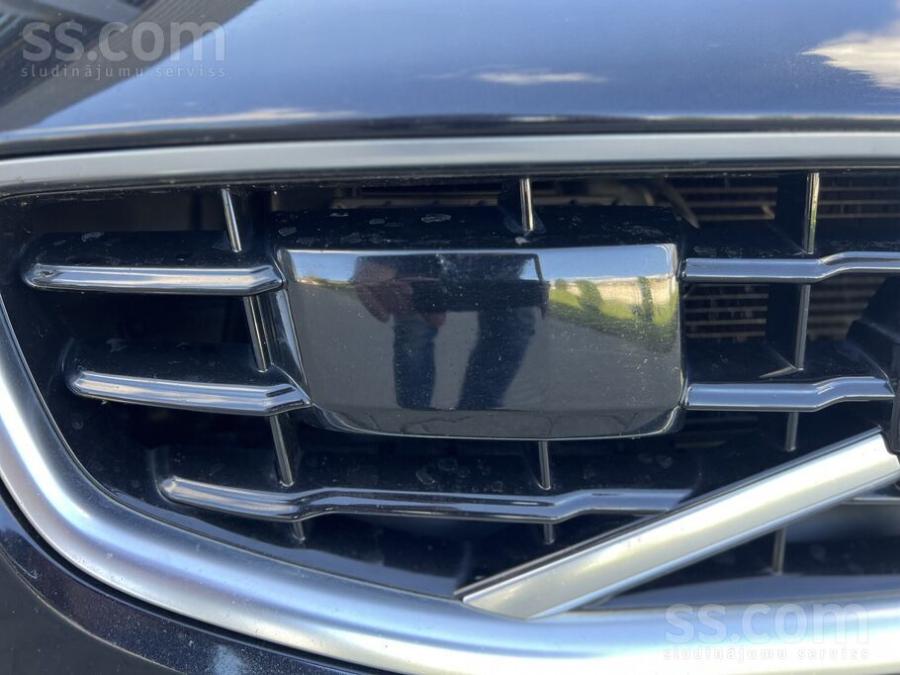 Melns Volvo V60 2013 Jēkabpils, ar dzinēja tilpumu 2.40 L un nobraukumu 189 tūkst. km par 7700 €, foto 14 vietnē AUTOMOTO.COM.LV