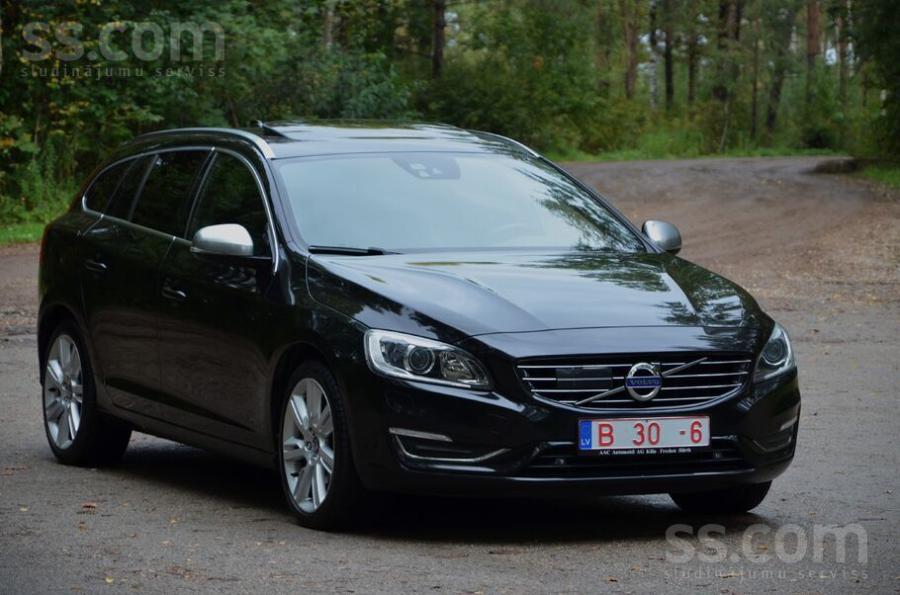 Black Volvo V60 2013 in Riga, with an engine capacity of 2.40 L and mileage of 304 thousand km for 7990 €, photo 1 on AUTOMOTO.COM.LV