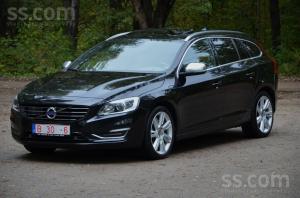 Black Volvo V60 2013 in Riga, with an engine capacity of 2.40 L and mileage of 304 thousand km for 7990 €, photo 7 on AUTOMOTO.COM.LV