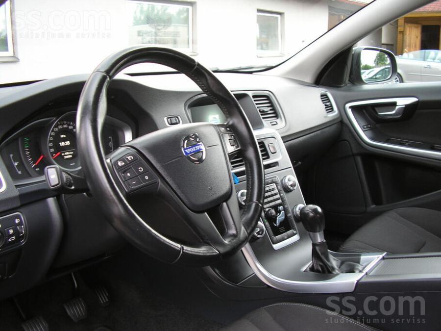 Black Volvo V60 2014 in Riga, with an engine capacity of 2.00 L and mileage of 0 thousand km for 7950 €, photo 20 on AUTOMOTO.COM.LV