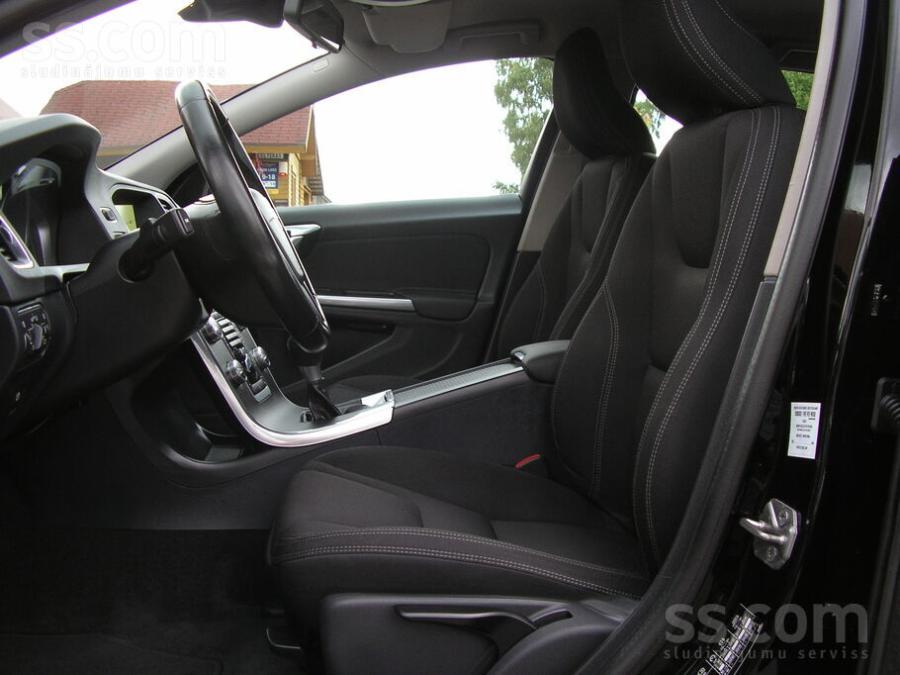 Black Volvo V60 2014 in Riga, with an engine capacity of 2.00 L and mileage of 0 thousand km for 7950 €, photo 21 on AUTOMOTO.COM.LV