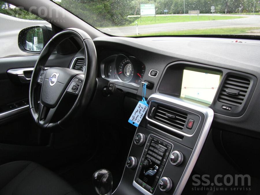 Black Volvo V60 2014 in Riga, with an engine capacity of 2.00 L and mileage of 0 thousand km for 7950 €, photo 27 on AUTOMOTO.COM.LV