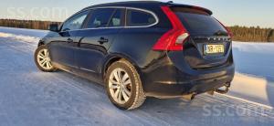 Black Volvo V60 2011 in Dobele, with an engine capacity of 2.00 L and mileage of 263 thousand km for 6565 €, photo  on AUTOMOTO.COM.LV