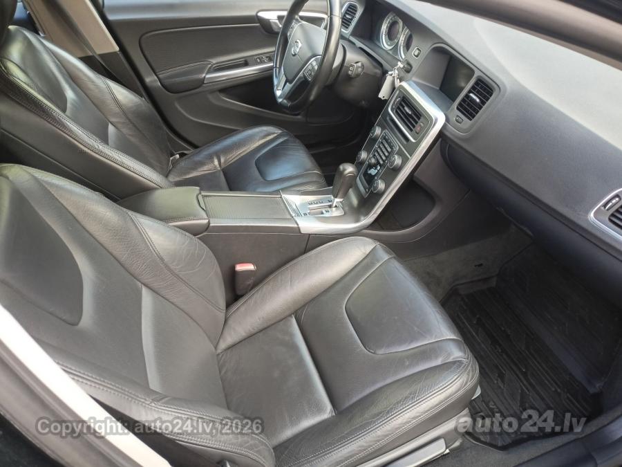Black Volvo V60 2011 in Paide, with an engine capacity of 2.00 L and mileage of 234 thousand km for 6800 €, photo 14 on AUTOMOTO.COM.LV