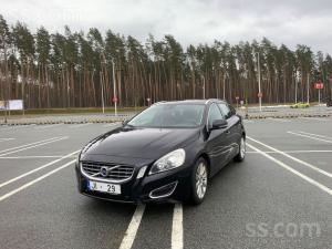 Black Volvo V60 2011 in Riga, with an engine capacity of 2.00 L and mileage of 275 thousand km for 6500 €, photo  on AUTOMOTO.COM.LV