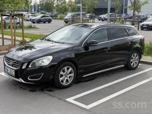 Black Volvo V60 2011 in Riga, with an engine capacity of 2.40 L and mileage of 321 thousand km for 4900 €, photo  on AUTOMOTO.COM.LV