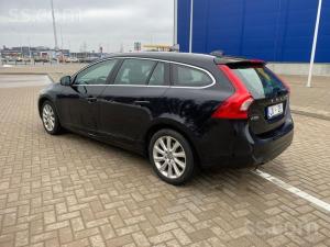 Black Volvo V60 2011 in Riga, with an engine capacity of 2.00 L and mileage of 275 thousand km for 6500 €, photo 23 on AUTOMOTO.COM.LV
