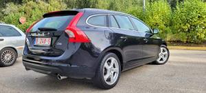 Black Volvo V60 2011 in Riga, with an engine capacity of 2.40 L and mileage of 223 thousand km for 7990 €, photo 3 on AUTOMOTO.COM.LV