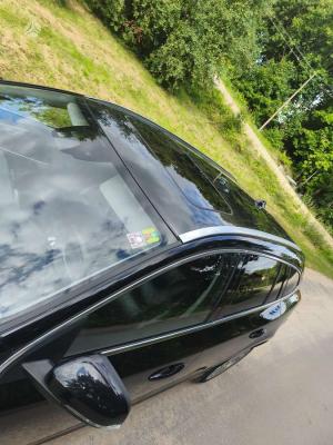 Black Volvo V60 2011 in Vilnius, with an engine capacity of 2.40 L and mileage of 302 thousand km for 5700 €, photo 5 on AUTOMOTO.COM.LV