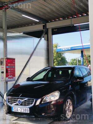 Black Volvo V60 2012 in Riga, with an engine capacity of 2.00 L and mileage of 244 thousand km for 4900 €, photo 2 on AUTOMOTO.COM.LV