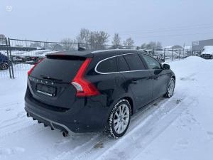 Black Volvo V60 2012 in Marijampole, with an engine capacity of 1.56 L and mileage of 216 thousand km for 5450 €, photo 5 on AUTOMOTO.COM.LV
