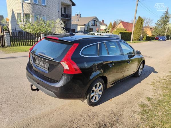 Black Volvo V60 2012 in Kaunas, with an engine capacity of 1.60 L and mileage of 300 thousand km for 4750 €, photo 3 on AUTOMOTO.COM.LV