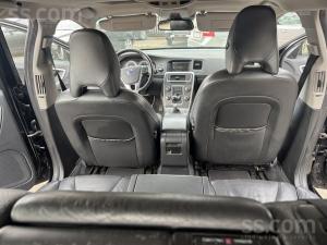 Black Volvo V60 2012 in Riga, with an engine capacity of 2.40 L and mileage of 248 thousand km for 6550 €, photo 17 on AUTOMOTO.COM.LV
