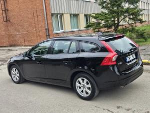 Black Volvo V60 2012 in Jekabpils, with an engine capacity of 1.60 L and mileage of 225 thousand km for 6390 €, photo 11 on AUTOMOTO.COM.LV