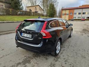 Black Volvo V60 2012 in Jekabpils, with an engine capacity of 2.00 L and mileage of 261 thousand km for 6990 €, photo 9 on AUTOMOTO.COM.LV