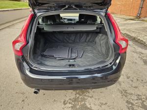Black Volvo V60 2012 in Jekabpils, with an engine capacity of 2.00 L and mileage of 261 thousand km for 6990 €, photo 16 on AUTOMOTO.COM.LV