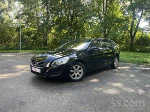 Black Volvo V60 2012 in Riga, with an engine capacity of 2.00 L and mileage of 220 thousand km for 5800 €, photo  on AUTOMOTO.COM.LV