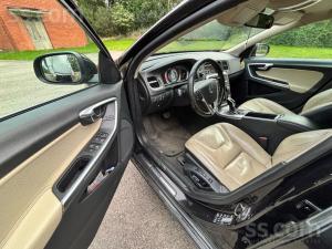 Black Volvo V60 2012 in Preili, with an engine capacity of 2.40 L and mileage of 307 thousand km for 6550 €, photo 14 on AUTOMOTO.COM.LV