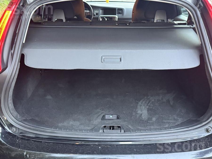 Black Volvo V60 2012 in Riga, with an engine capacity of 2.00 L and mileage of 0 thousand km for 3700 €, photo 25 on AUTOMOTO.COM.LV