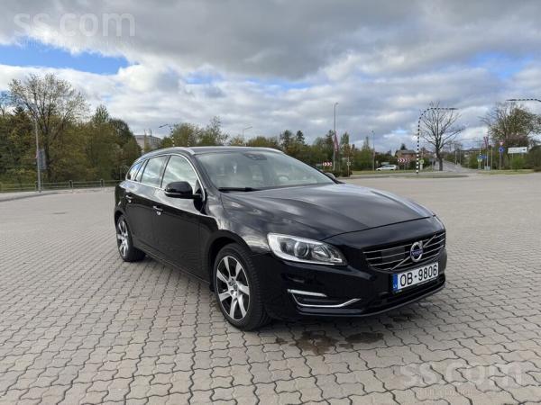 Black Volvo V60 2013 in Kuldiga, with an engine capacity of 2.40 L and mileage of 298 thousand km for 8450 €, photo 1 on AUTOMOTO.COM.LV