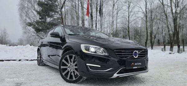 Black Volvo V60 2013 in Kazlu Ruda, with an engine capacity of 2.40 L and mileage of 235 thousand km for 7500 €, photo 1 on AUTOMOTO.COM.LV