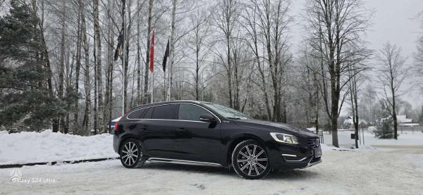 Black Volvo V60 2013 in Kazlu Ruda, with an engine capacity of 2.40 L and mileage of 235 thousand km for 7500 €, photo 3 on AUTOMOTO.COM.LV