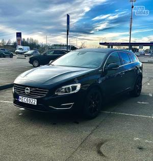 Black Volvo V60 2013 in Vilnius, with an engine capacity of 2.40 L and mileage of 222 thousand km for 8200 €, photo 7 on AUTOMOTO.COM.LV