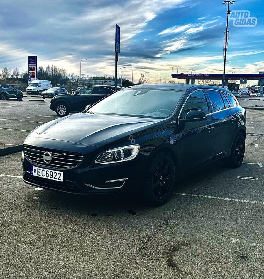 Black Volvo V60 2013 in Vilnius, with an engine capacity of 2.40 L and mileage of 222 thousand km for 8200 €, photo 7 on AUTOMOTO.COM.LV