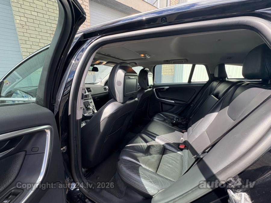 Melns Volvo V60 2013 Paide, ar dzinēja tilpumu 2.40 L un nobraukumu 294 tūkst. km par 8490 €, foto 14 vietnē AUTOMOTO.COM.LV