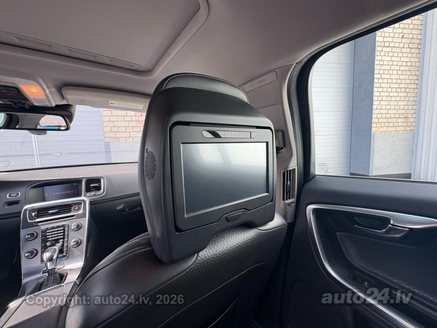 Melns Volvo V60 2013 Paide, ar dzinēja tilpumu 2.40 L un nobraukumu 294 tūkst. km par 8490 €, foto 20 vietnē AUTOMOTO.COM.LV