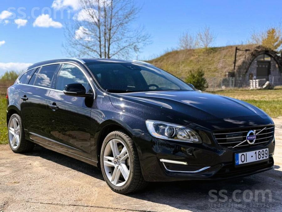Melns Volvo V60 2013 Rīga, ar dzinēja tilpumu 2.40 L un nobraukumu 251 tūkst. km par 7990 €, foto 1 vietnē AUTOMOTO.COM.LV
