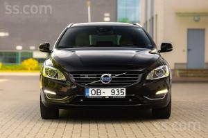 Black Volvo V60 2013 in Jelgava, with an engine capacity of 2.40 L and mileage of 192 thousand km for 10900 €, photo 4 on AUTOMOTO.COM.LV