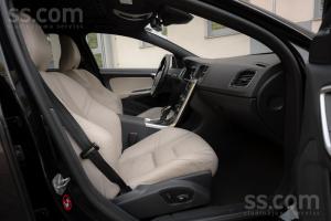 Black Volvo V60 2013 in Jelgava, with an engine capacity of 2.40 L and mileage of 192 thousand km for 10900 €, photo 14 on AUTOMOTO.COM.LV