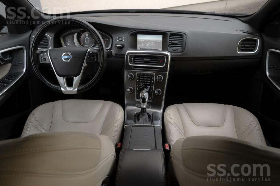Black Volvo V60 2013 in Jelgava, with an engine capacity of 2.40 L and mileage of 192 thousand km for 10900 €, photo 22 on AUTOMOTO.COM.LV