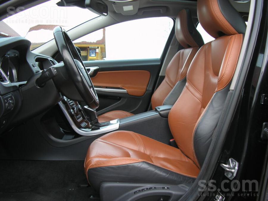 Black Volvo V60 2013 in Riga, with an engine capacity of 2.40 L and mileage of 0 thousand km for 8950 €, photo 21 on AUTOMOTO.COM.LV