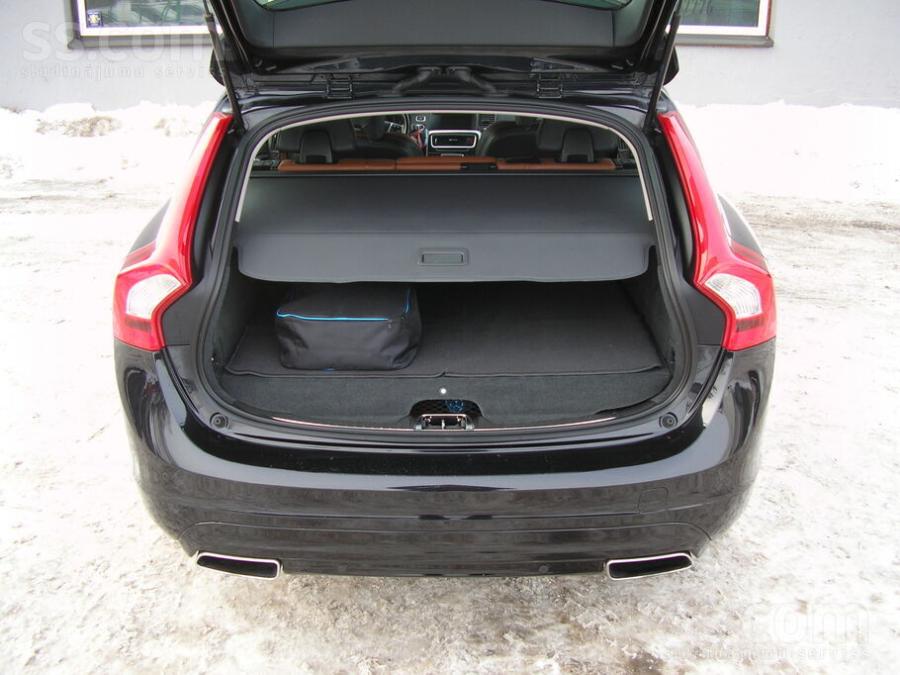 Black Volvo V60 2013 in Riga, with an engine capacity of 2.40 L and mileage of 0 thousand km for 8950 €, photo 24 on AUTOMOTO.COM.LV