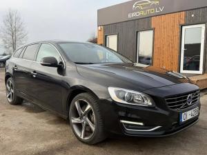 Black Volvo V60 2013 in Riga, with an engine capacity of 2.40 L and mileage of 270 thousand km for 7990 €, photo  on AUTOMOTO.COM.LV