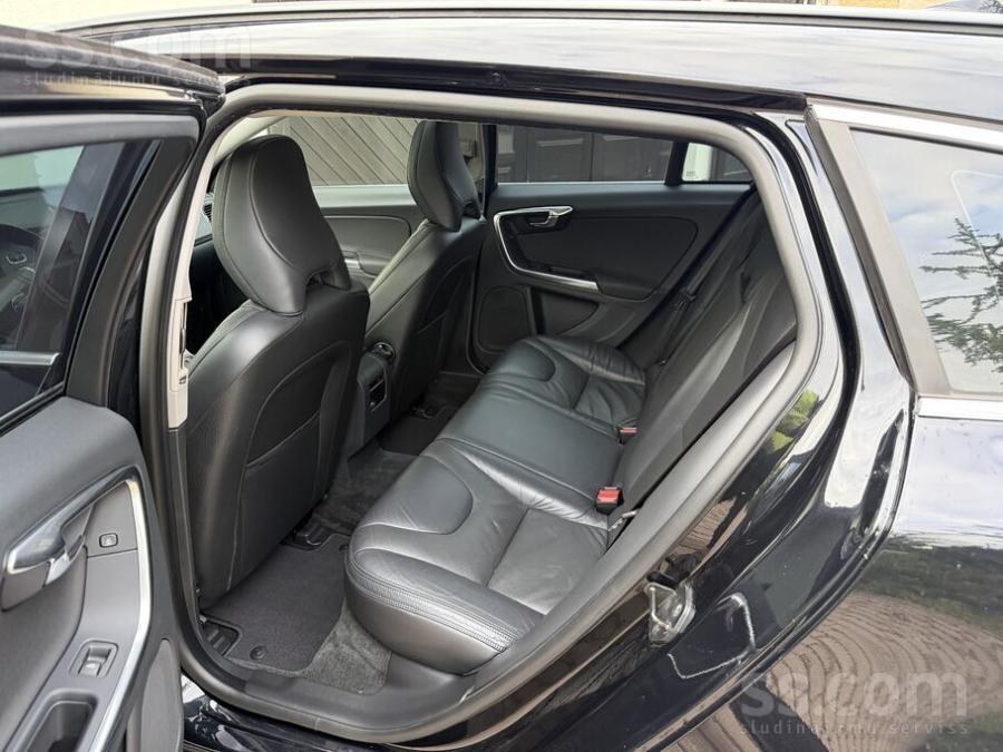 Black Volvo V60 2013 in Gulbene, with an engine capacity of 2.40 L and mileage of 275 thousand km for 7990 €, photo 16 on AUTOMOTO.COM.LV