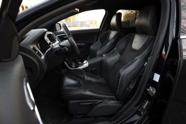 Black Volvo V60 2013 in Riga, with an engine capacity of 2.00 L and mileage of 254 thousand km for 10900 €, photo 10 on AUTOMOTO.COM.LV